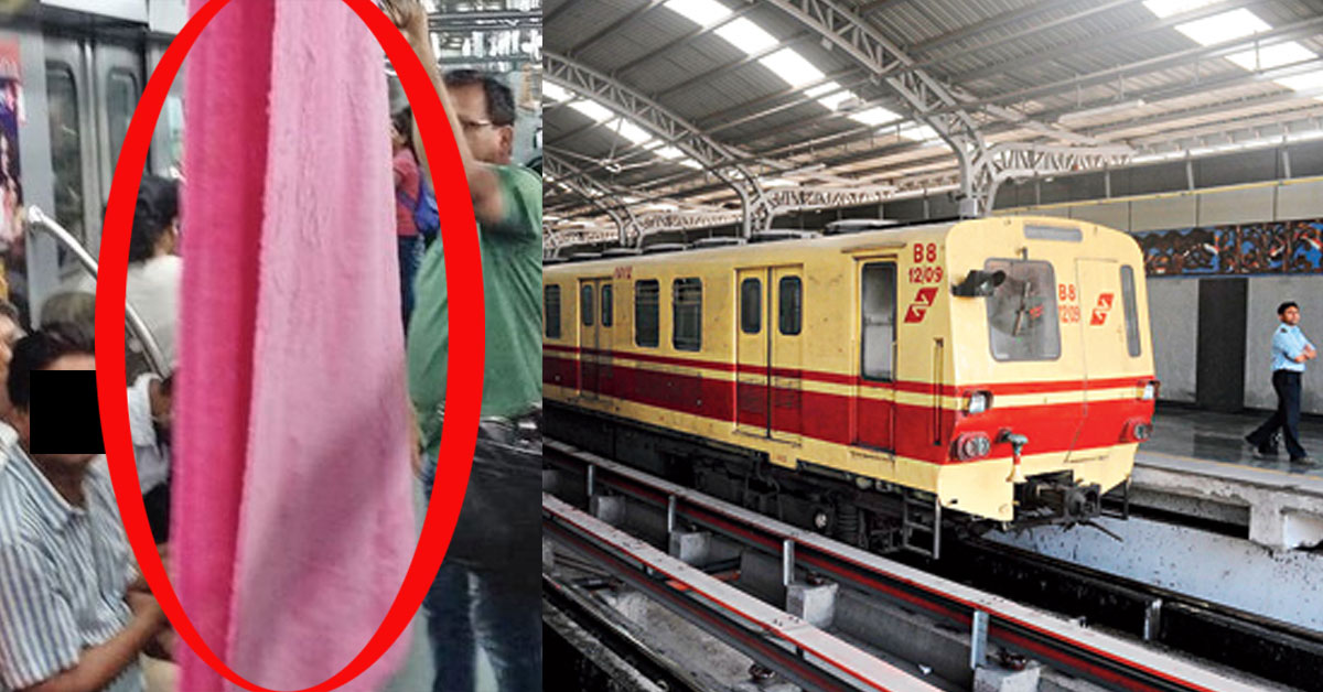 কলকাতা মেট্রো রেলে কাল গোলাপি রঙের ভেজা গামচা শোকালেন এক যাত্রী